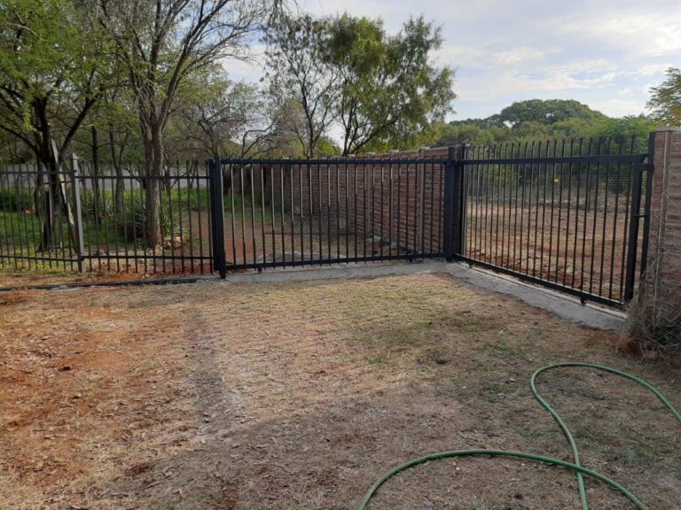 Steel Sliding Gates & Barbed Wire | Express Walls